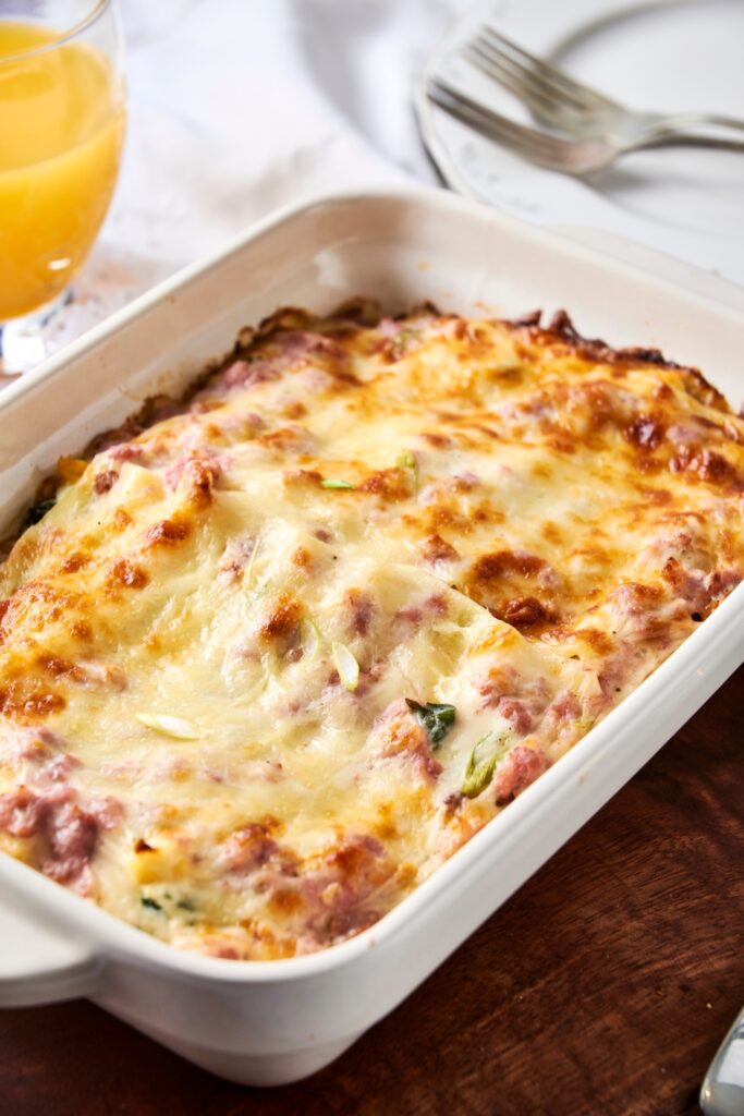 Breakfast Lasagna with Sausage, Eggs, Cheese, and Spinach